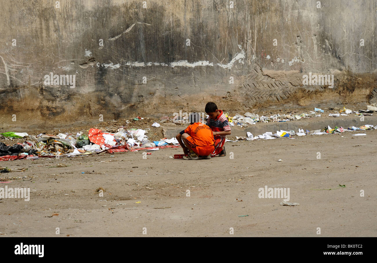 zabbaleen children searching for cans and plastic bottles , Zabbaleen ...