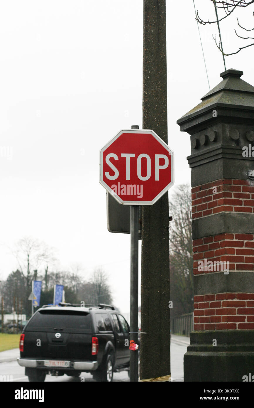 Stop sign on the street. Belgium Stock Photo - Alamy