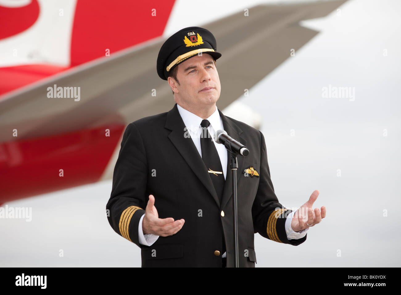 John Travolta wearing Qantas pilot's uniform, Melbourne airport, 2010 ...
