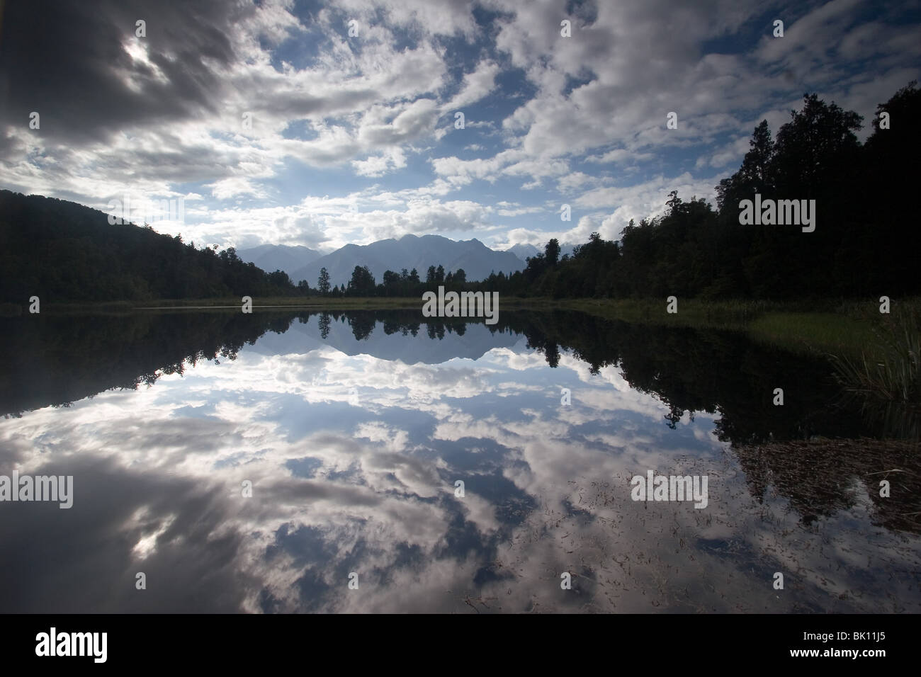 Great reflection on Lake Matheson New Zealand Stock Photo - Alamy