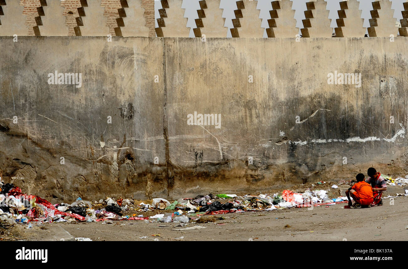 zabbaleen children searching for cans and plastic bottles , Zabbaleen ...