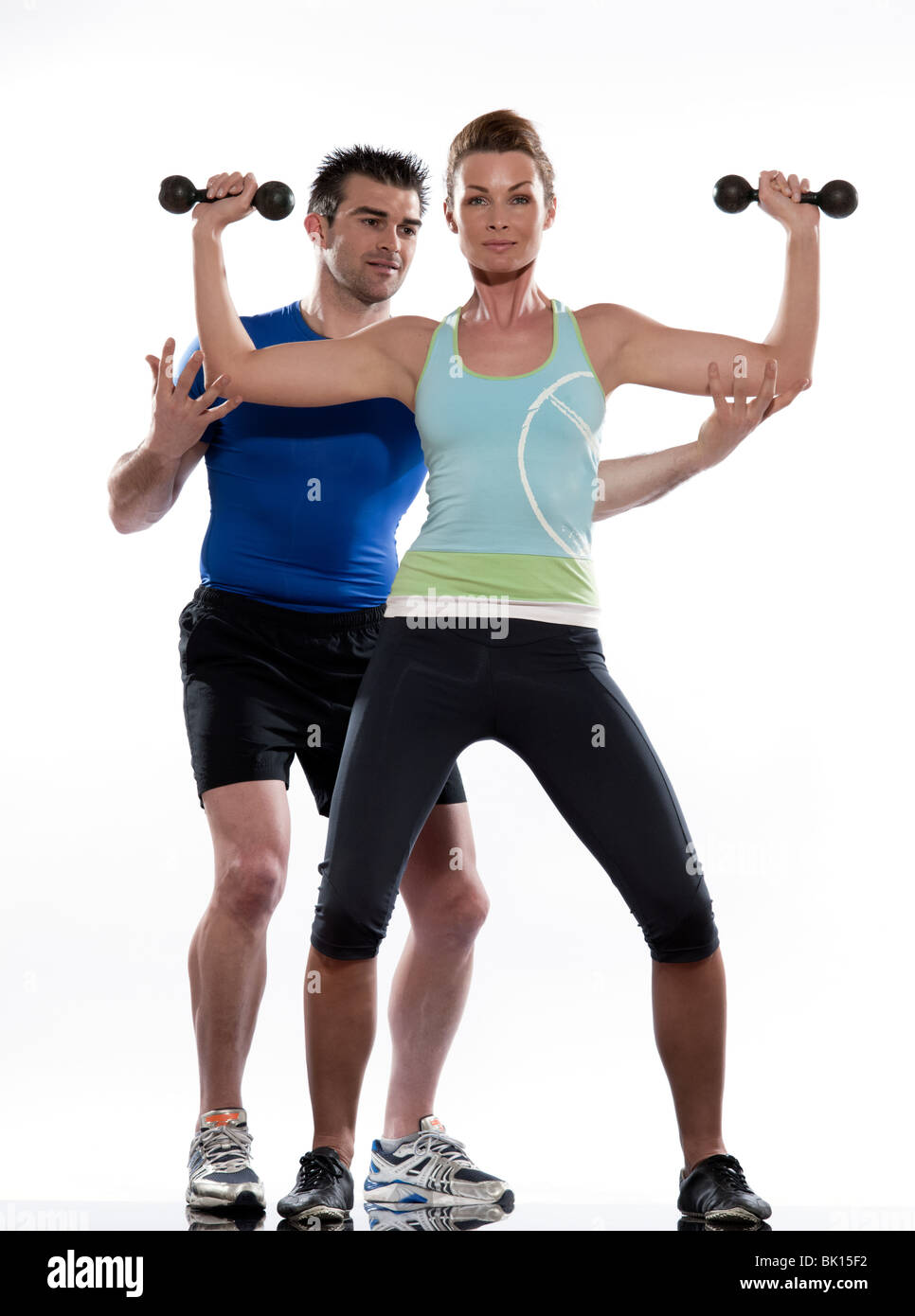 one caucasian couple man aerobic trainer positioning woman Workout ...