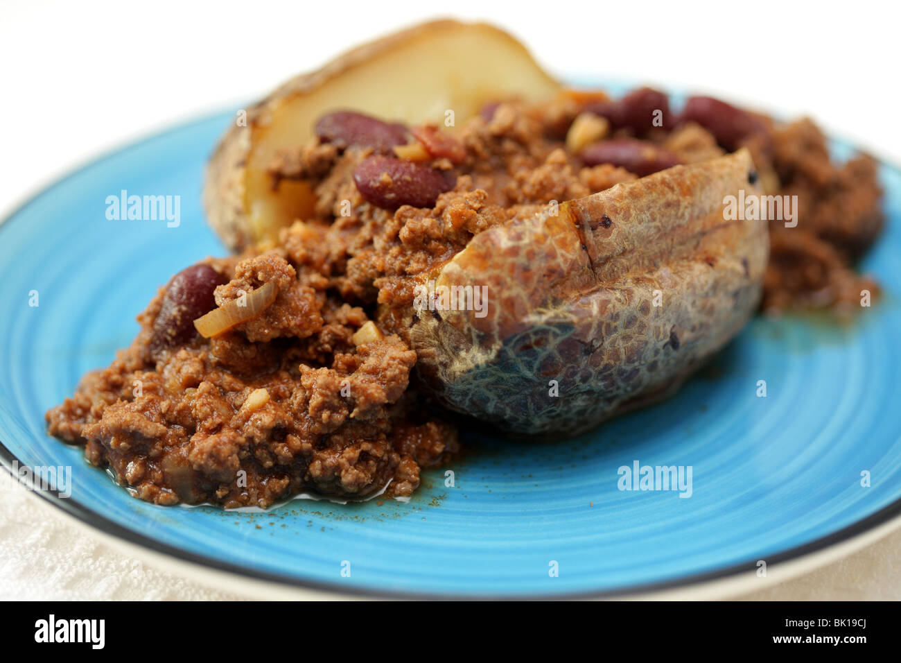 Jacket Potato with Chilli Con Carne Stock Photo - Alamy