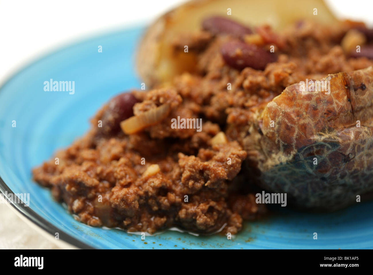 Baked jacket potato with minced beef hi-res stock photography and ...