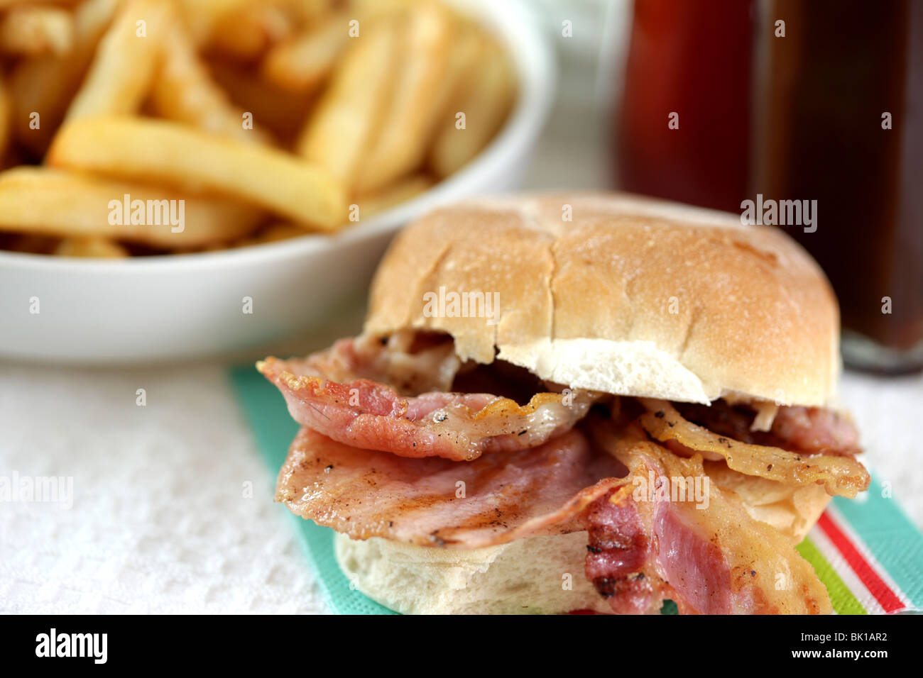 Freshly Cooked Grilled or Fried Bacon In A White Bread Roll Or Bap With ...