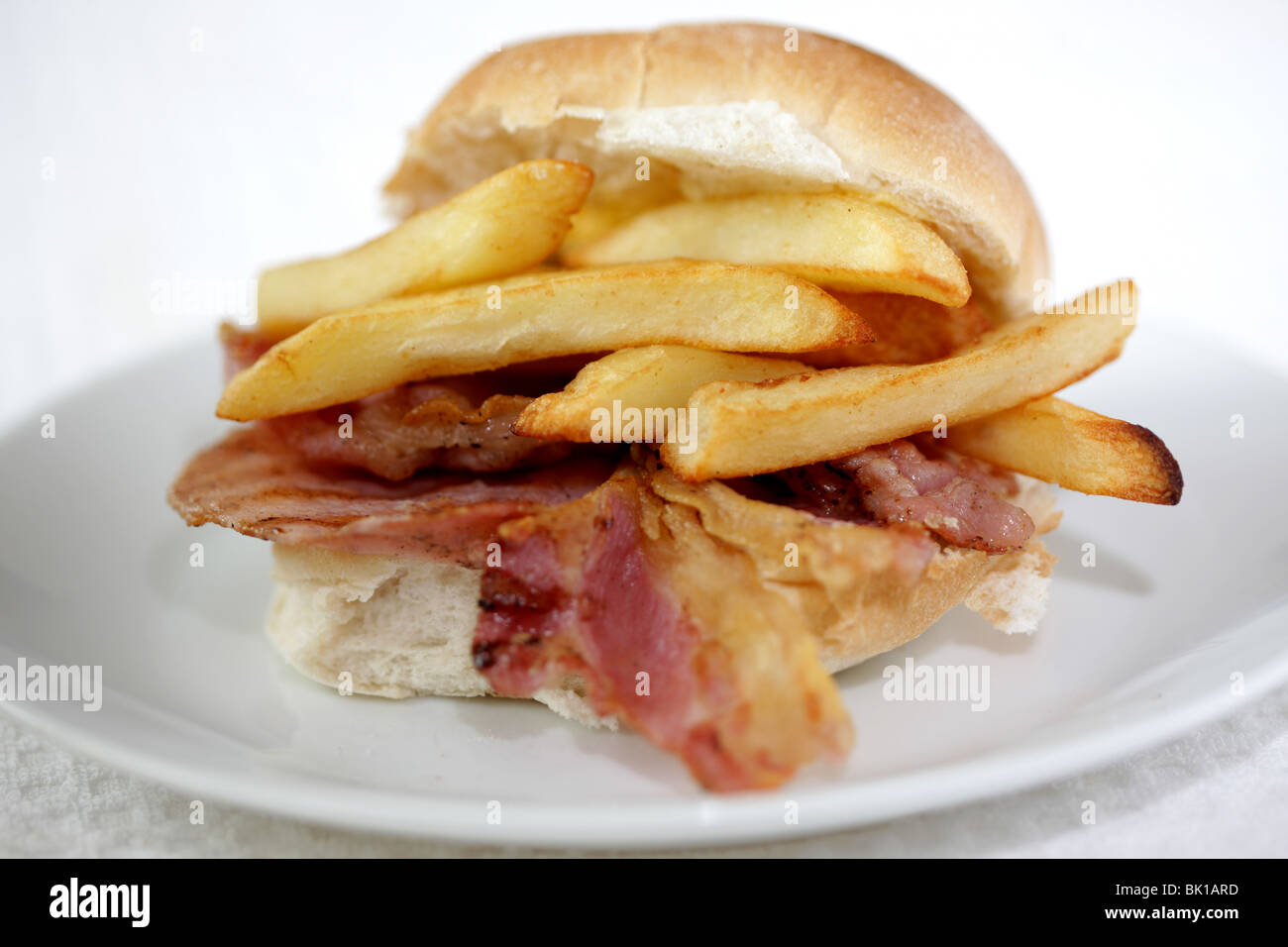 Freshly Cooked Grilled or Fried Bacon In A White Bread Roll Or Bap With ...