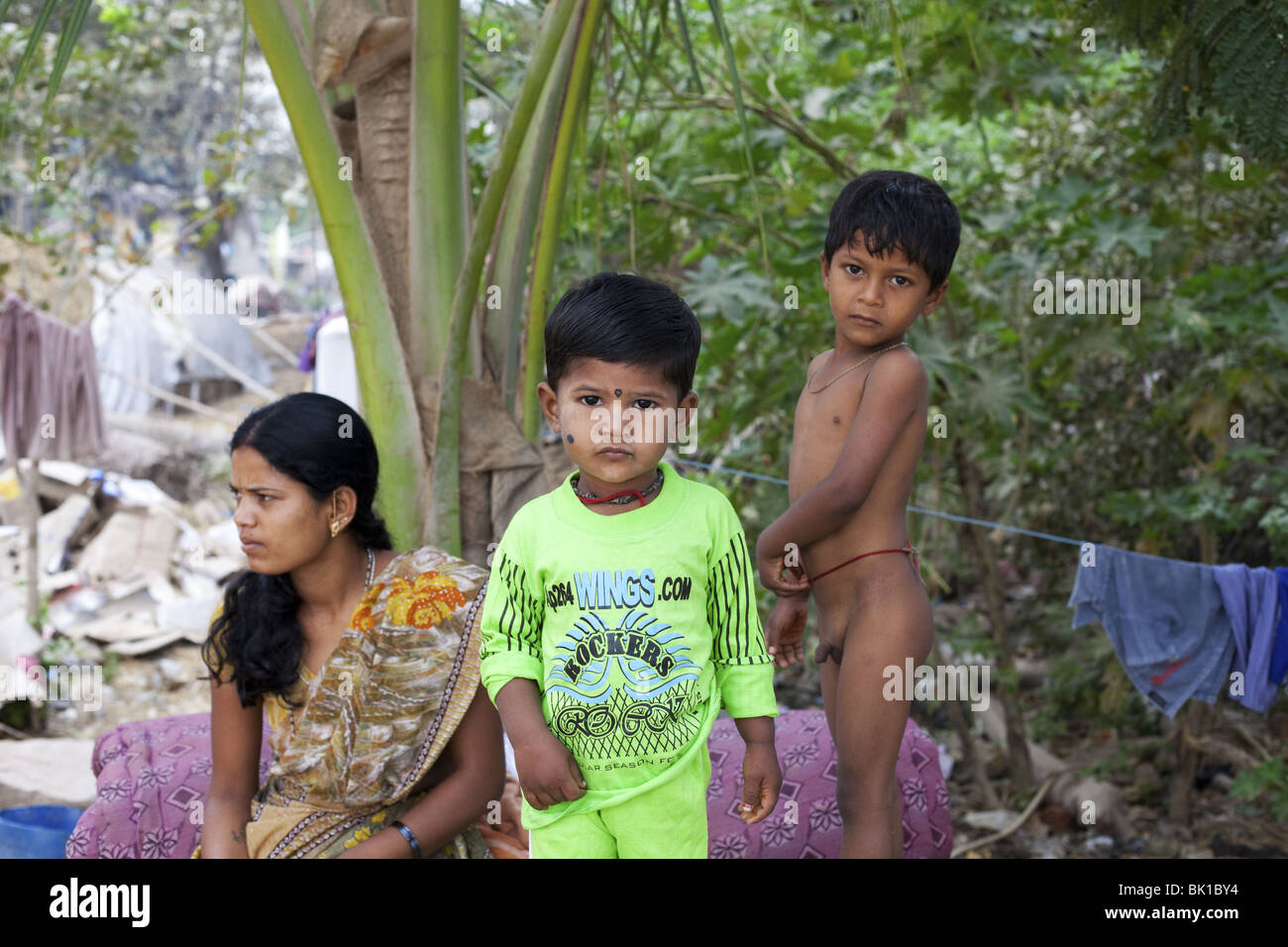 Child street kid poor rural washing hi-res stock photography and images ...