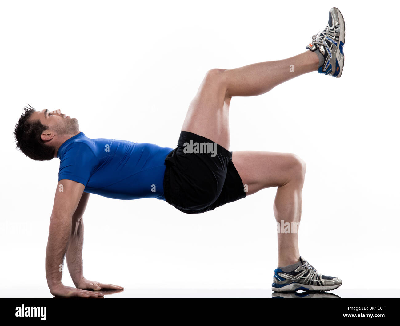 man doing workout on white isolated background Stock Photo - Alamy