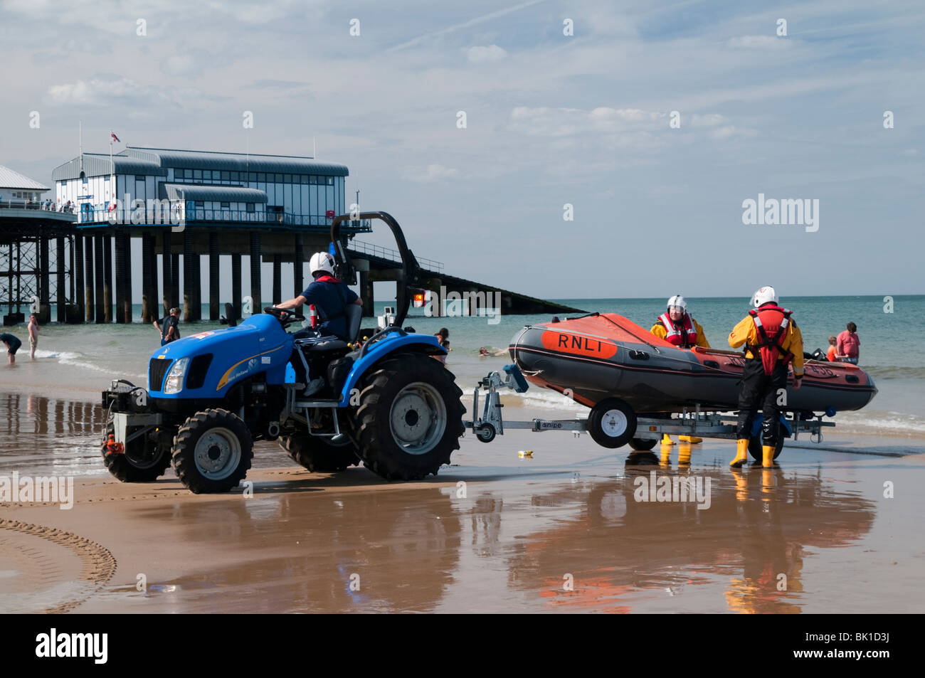 RNLI inflatable lifeboat being launched at Cromer Norfolk East Anglia ...