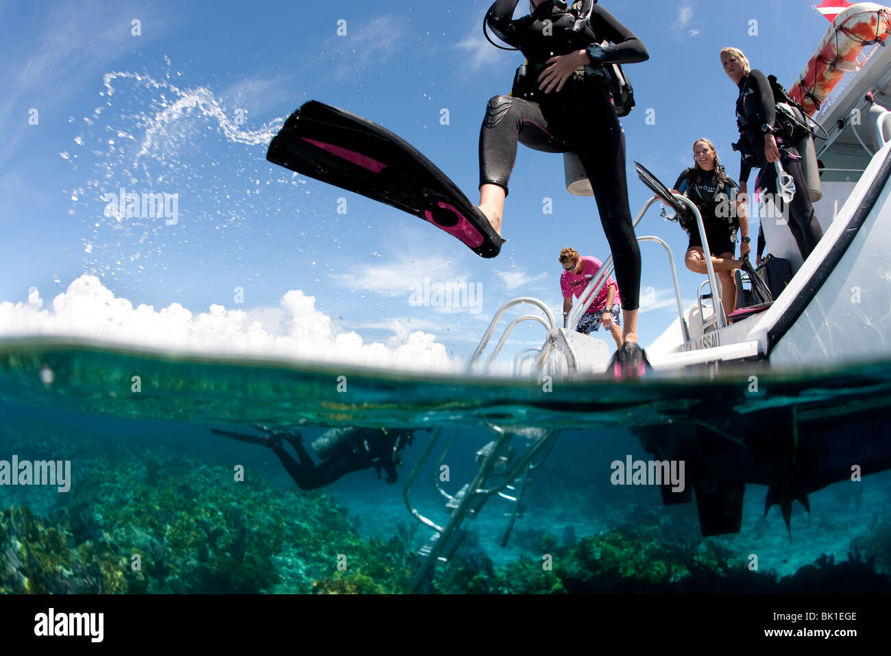 Scuba diver enters water from boat via giant stride entry Stock Photo ...