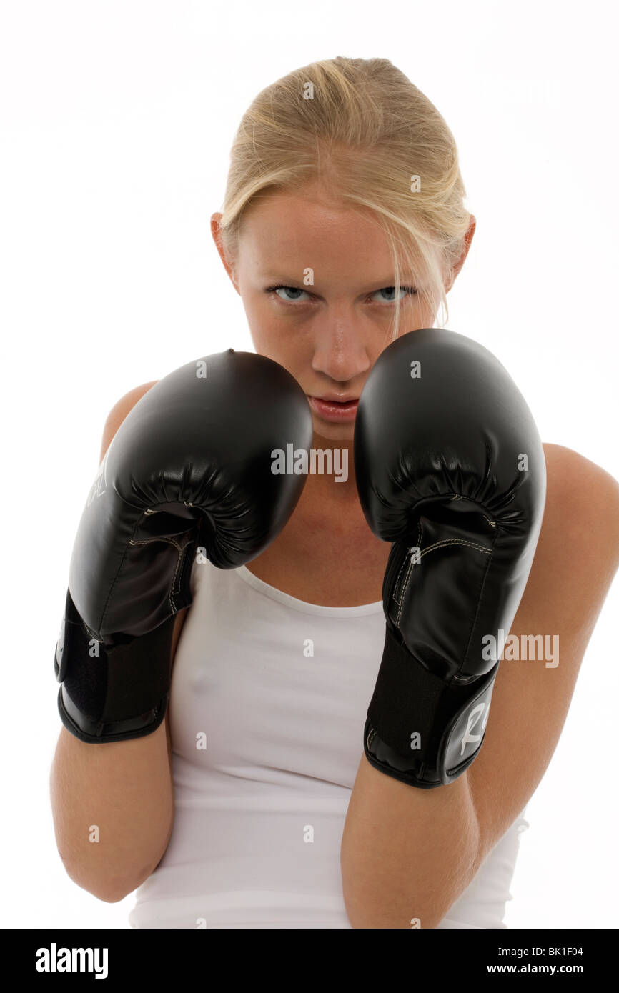 portrait of a young caucasian woman who does kick boxing with boxing ...