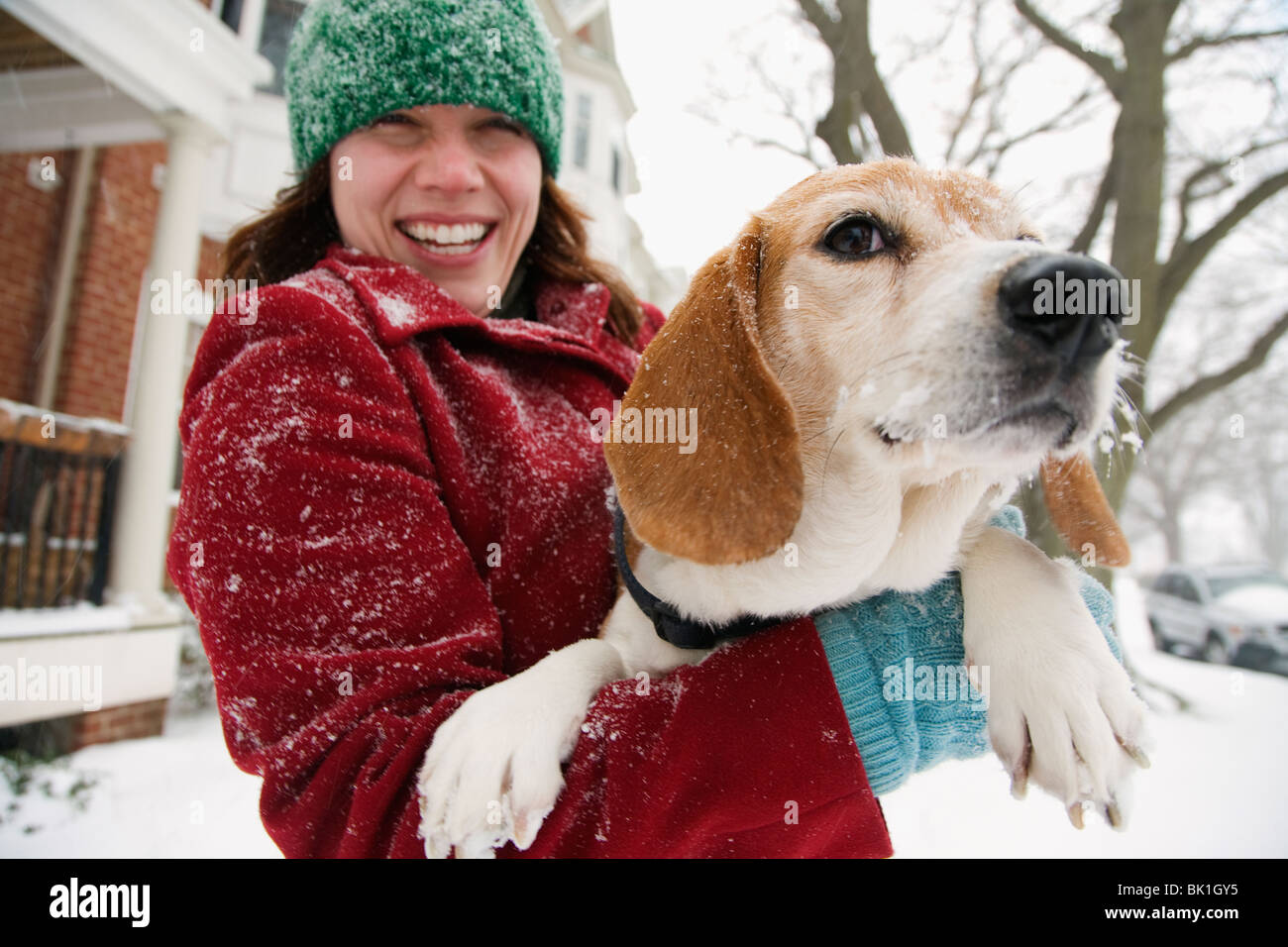Woman lifting dog one person hi-res stock photography and images - Alamy