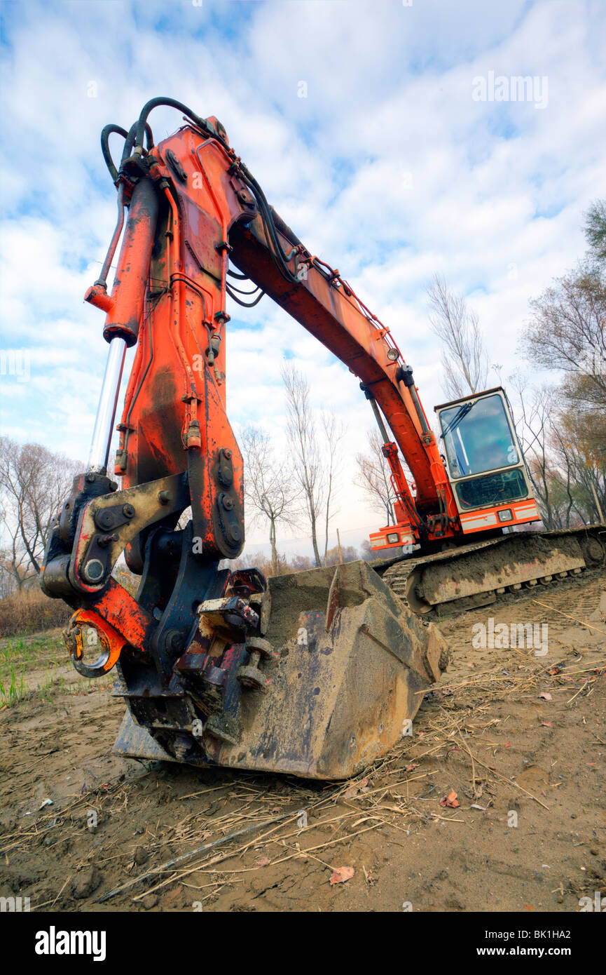Hydraulic Excavator on construction site Stock Photo - Alamy