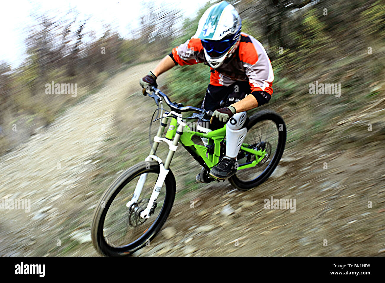 Young man riding a mountain bike Stock Photo - Alamy