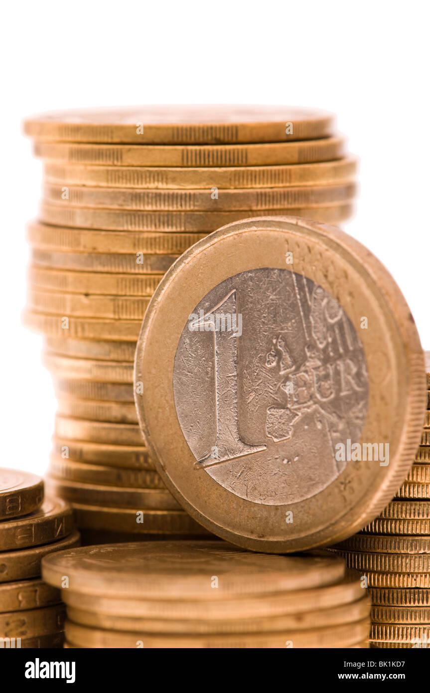 Heap of coins, isolated on white background Stock Photo - Alamy
