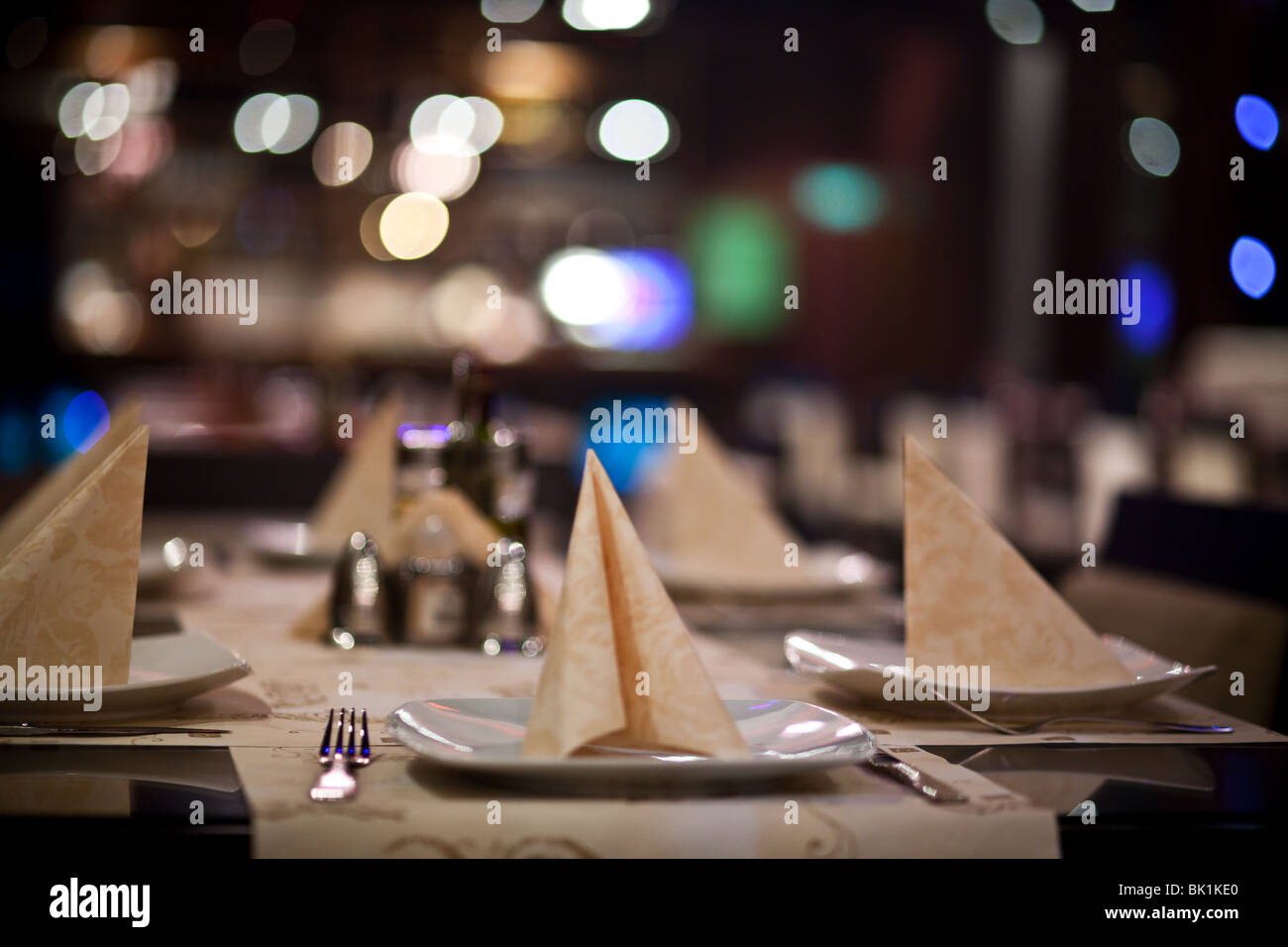 Dining table in a restaurant Stock Photo - Alamy