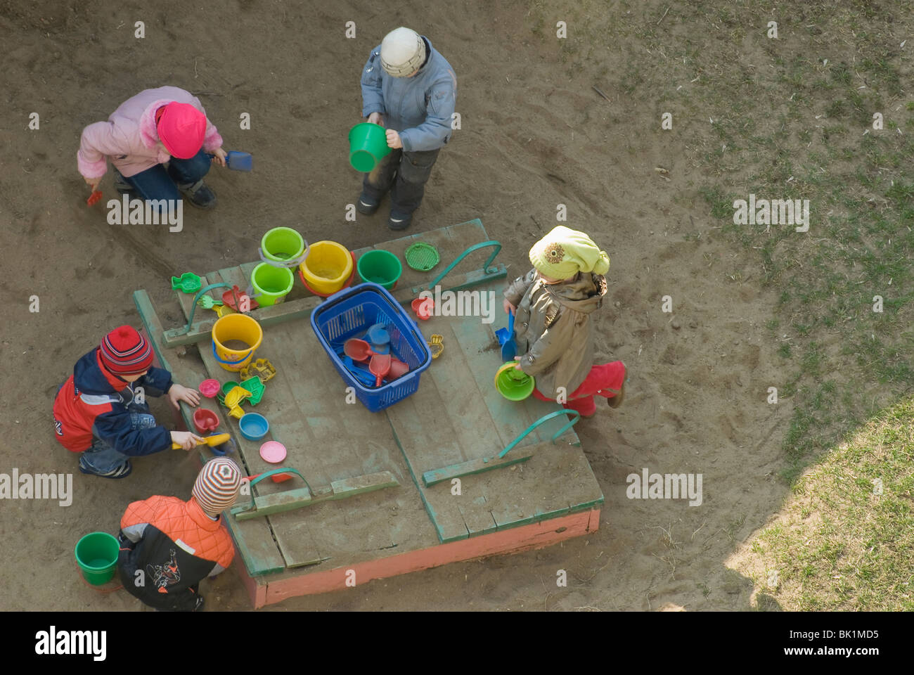 Kids playing on the kindergarten playground Stock Photo - Alamy