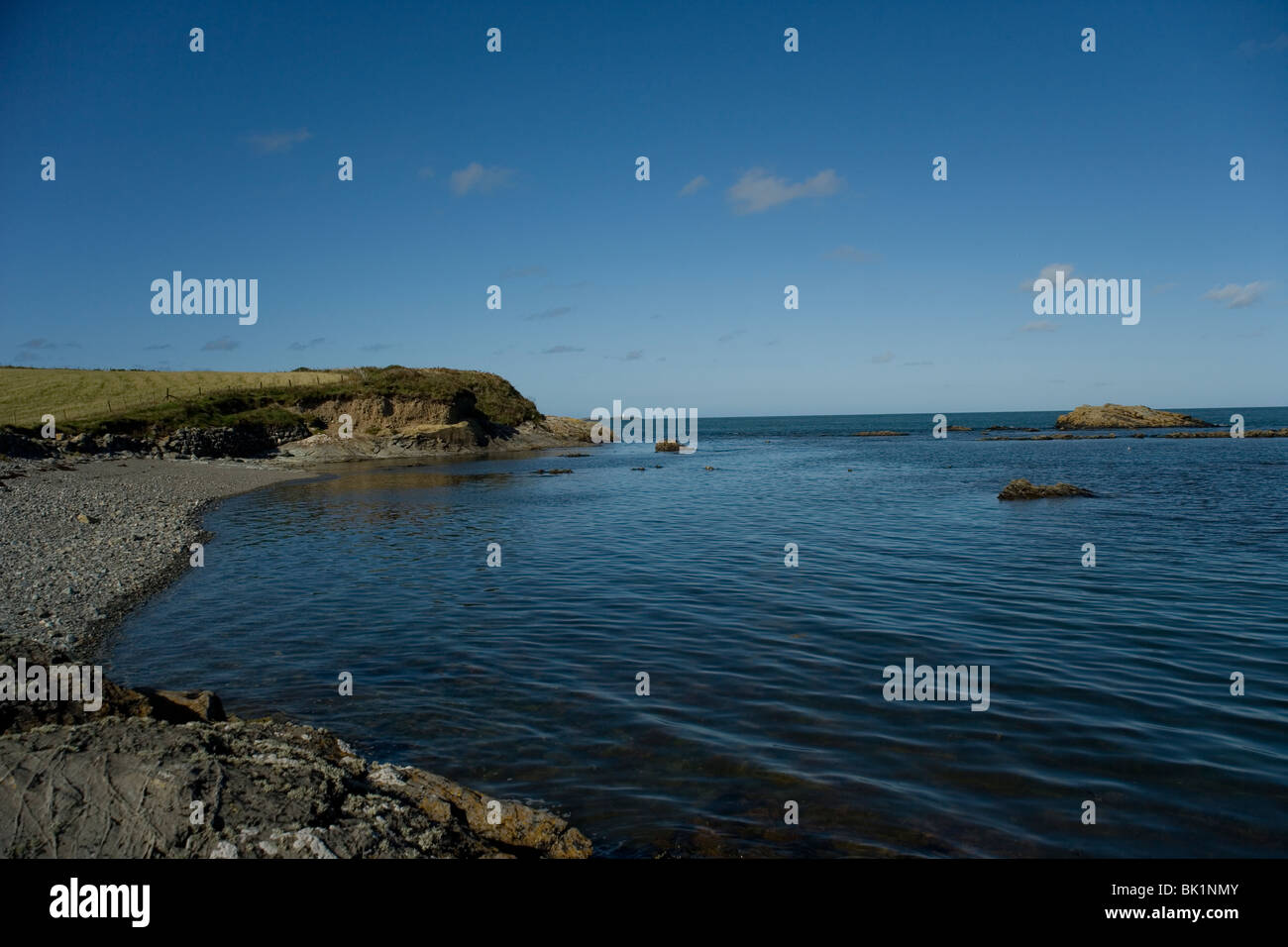 Skerries Lighthouse from the Anglesey coastal footpath Stock Photo - Alamy