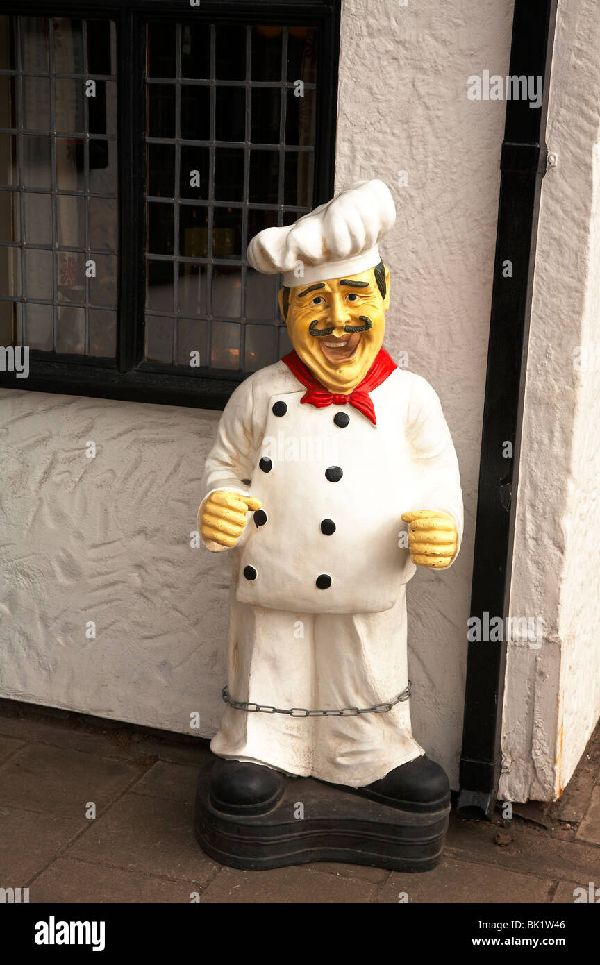 Happy Chef statue outside a British pub Stock Photo - Alamy