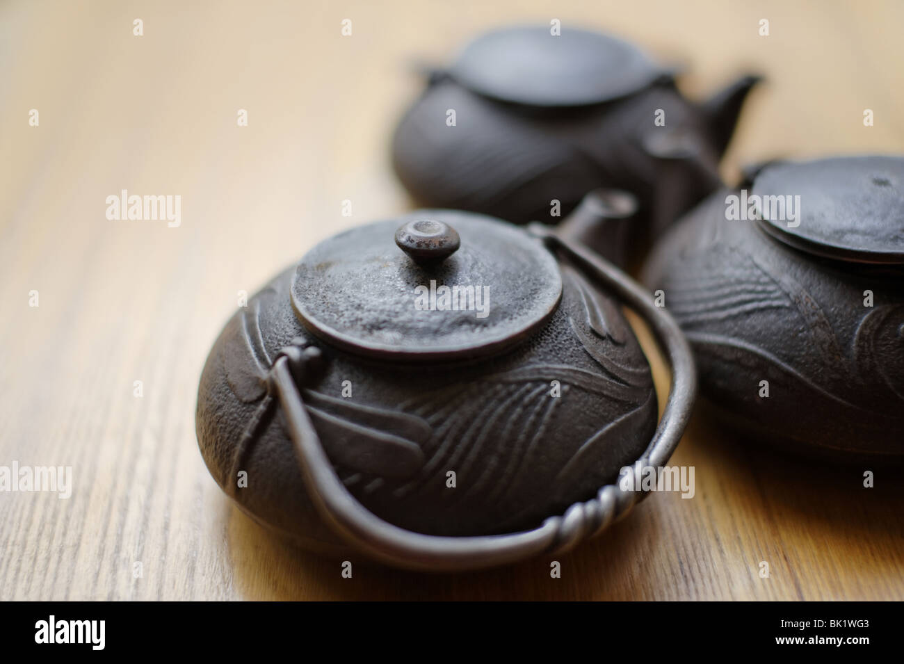 Group of teapots on a table Stock Photo - Alamy