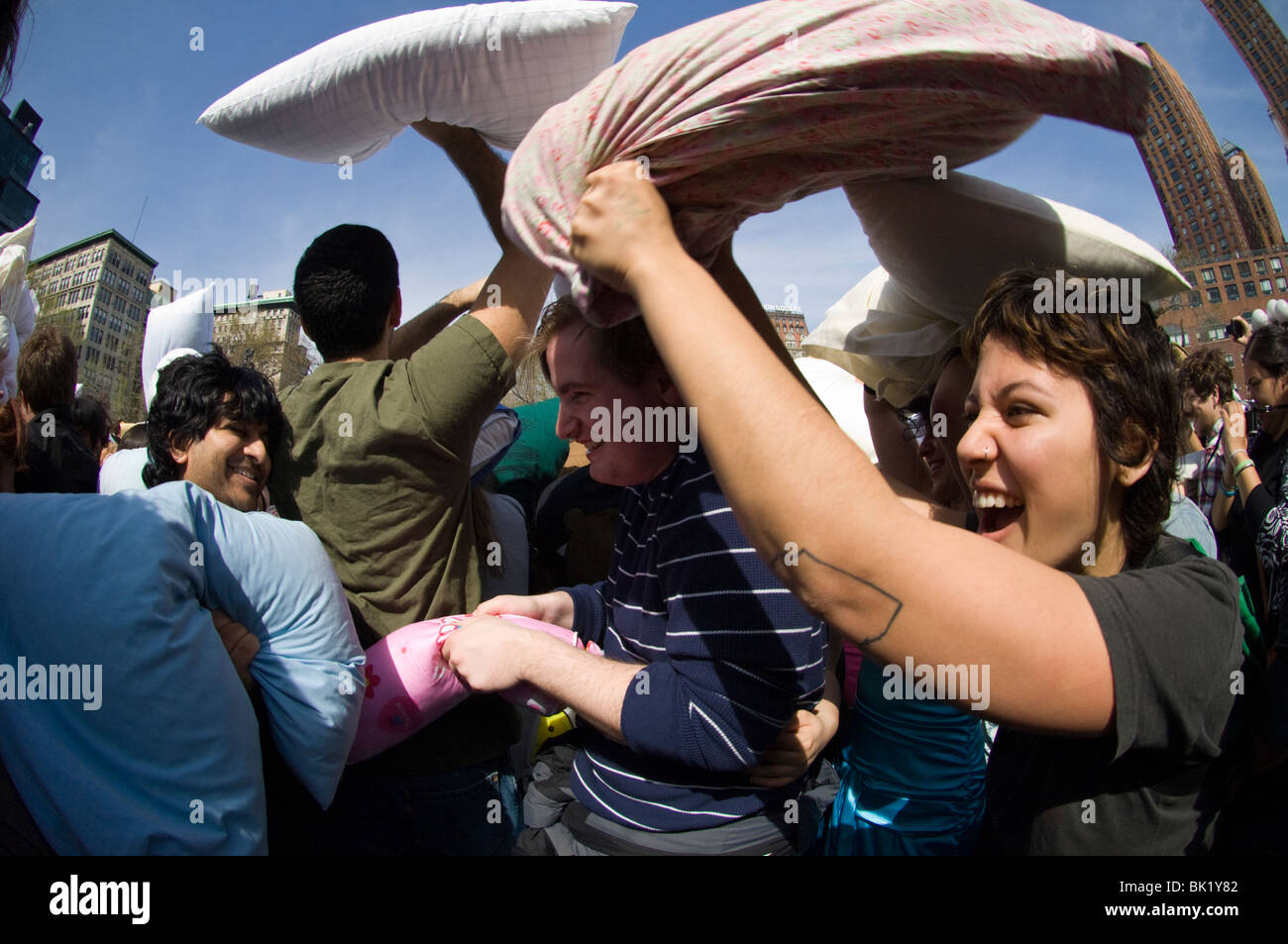 Hundreds of like-minded pillow fighters take out their aggression on ...