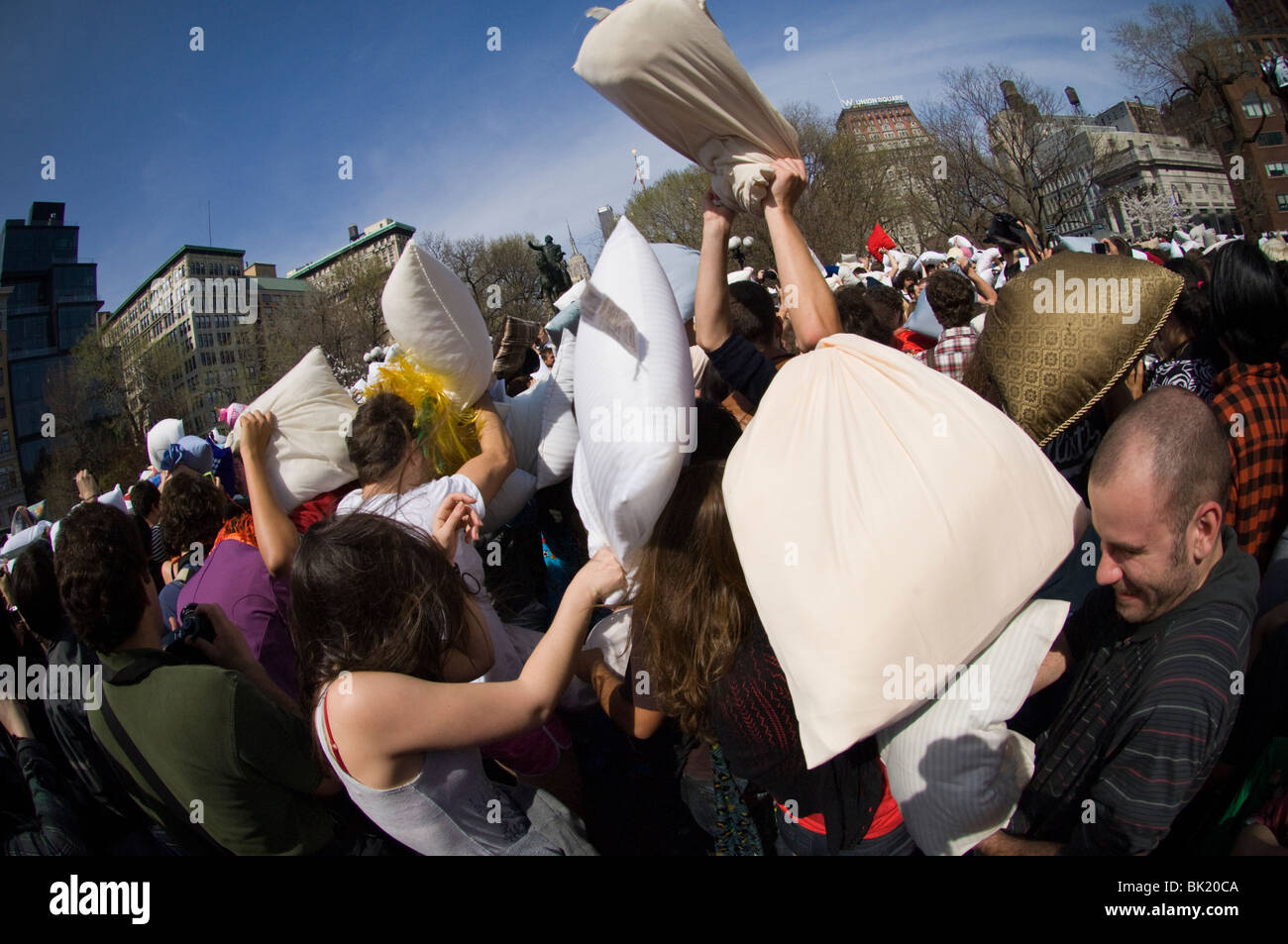 Hundreds of like-minded pillow fighters take out their aggression on ...