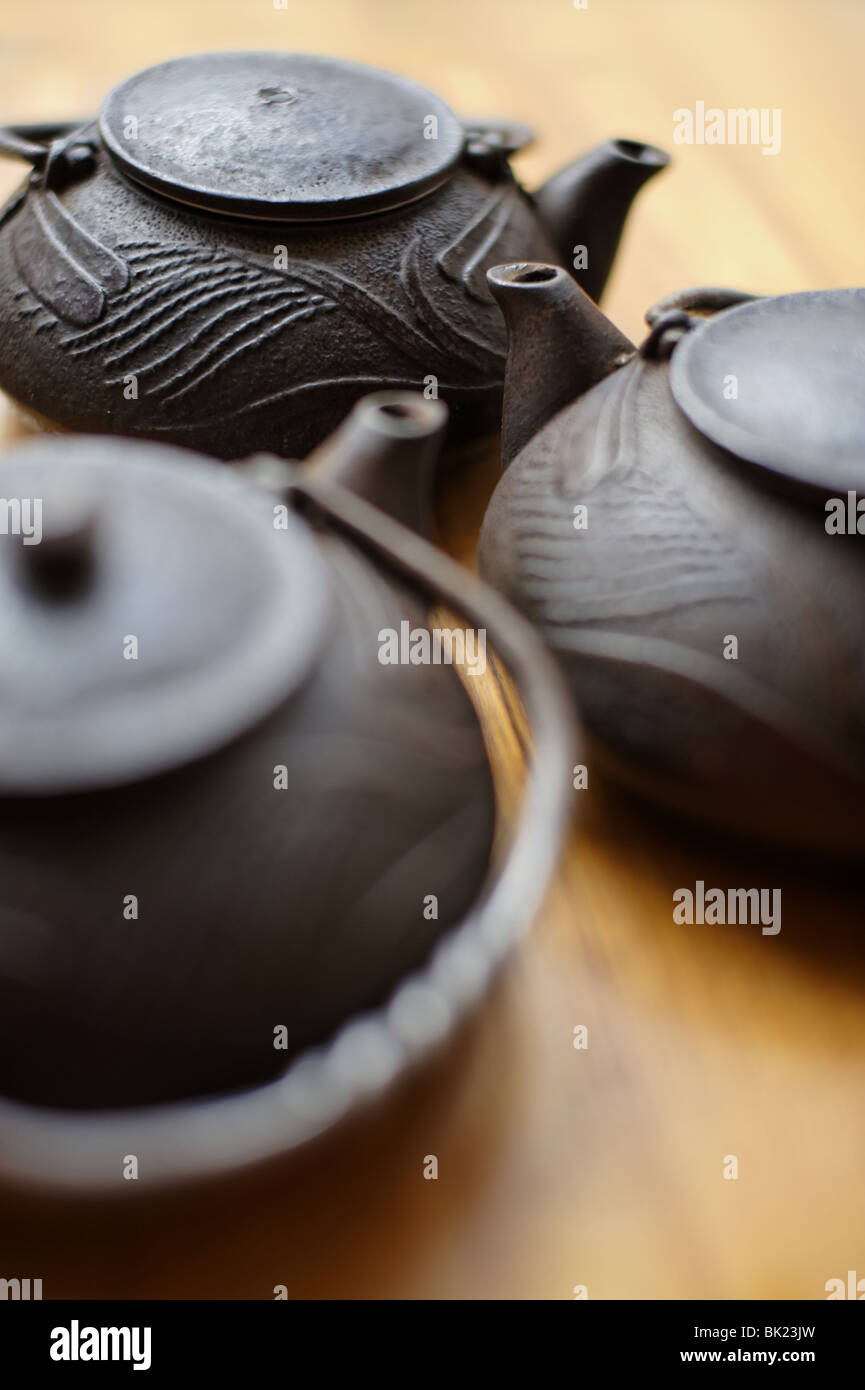 Group of teapots on a table Stock Photo - Alamy