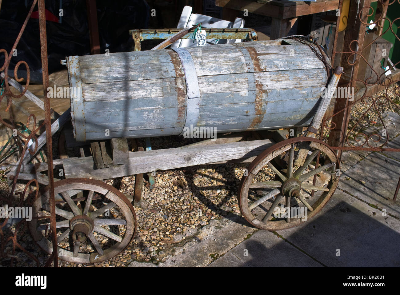 Old wooden dog drawn water cart in a bygones sale Stock Photo - Alamy
