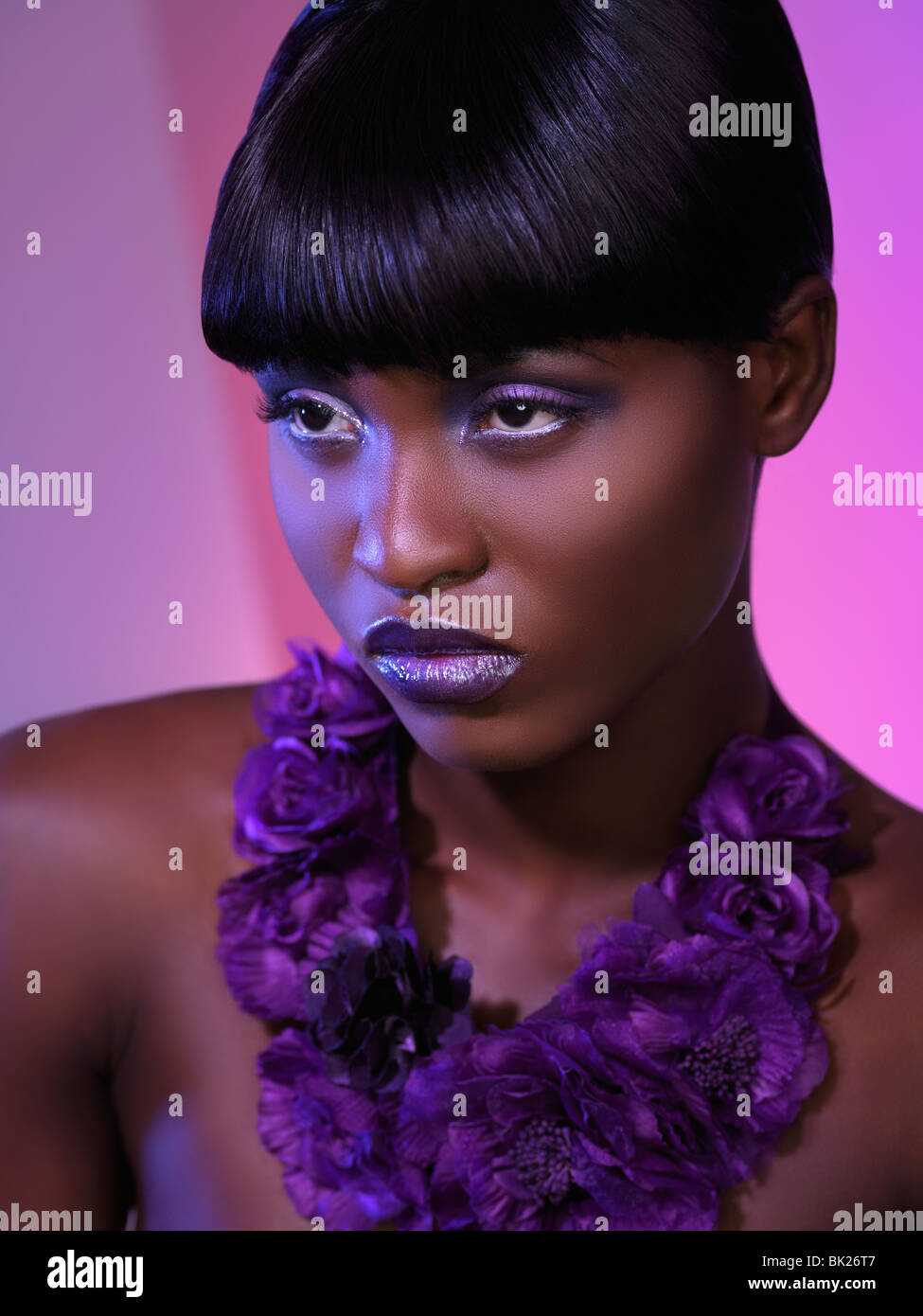 Beautiful young black woman headshot with makeup and background in ...