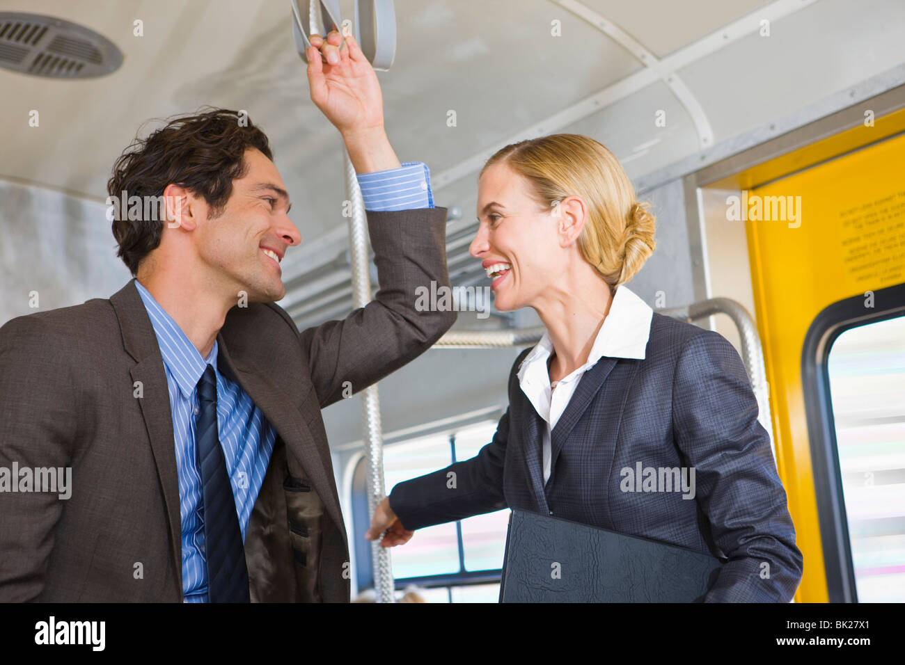 Hand holding strap on train hi-res stock photography and images - Alamy
