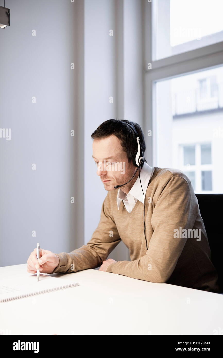 Man with telephone headset hi-res stock photography and images - Alamy