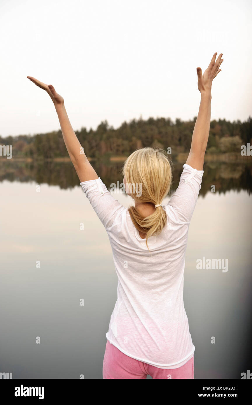 Blonde woman dancing rear view hi-res stock photography and images - Alamy