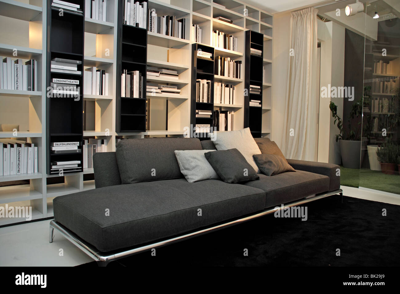 a couch in a living room Stock Photo - Alamy