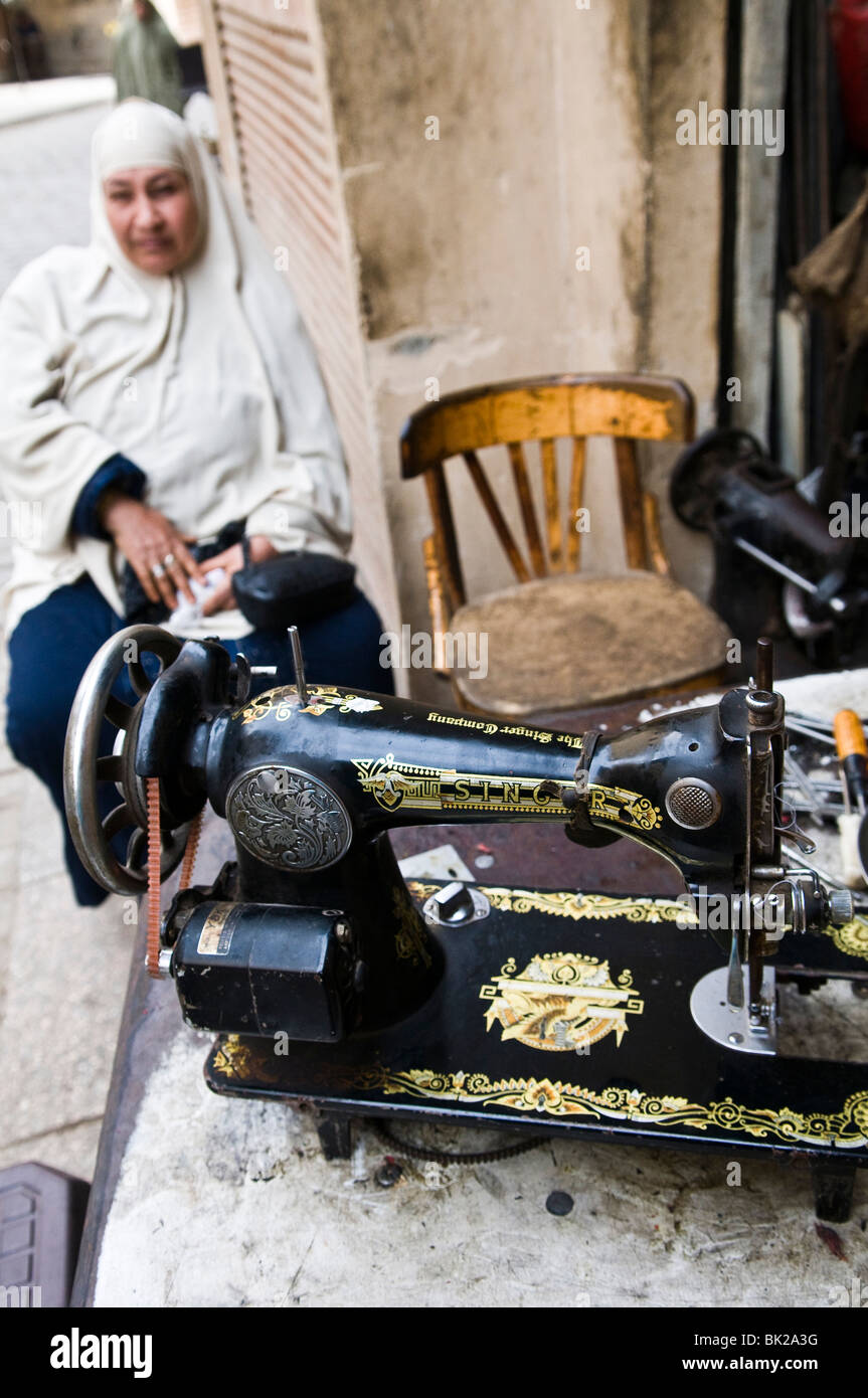 An old Singer sowing machine is still in use in Cairo Stock Photo - Alamy