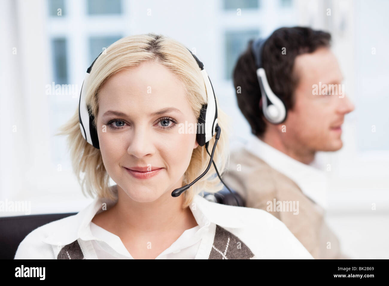 Female call center agent portrait Stock Photo - Alamy