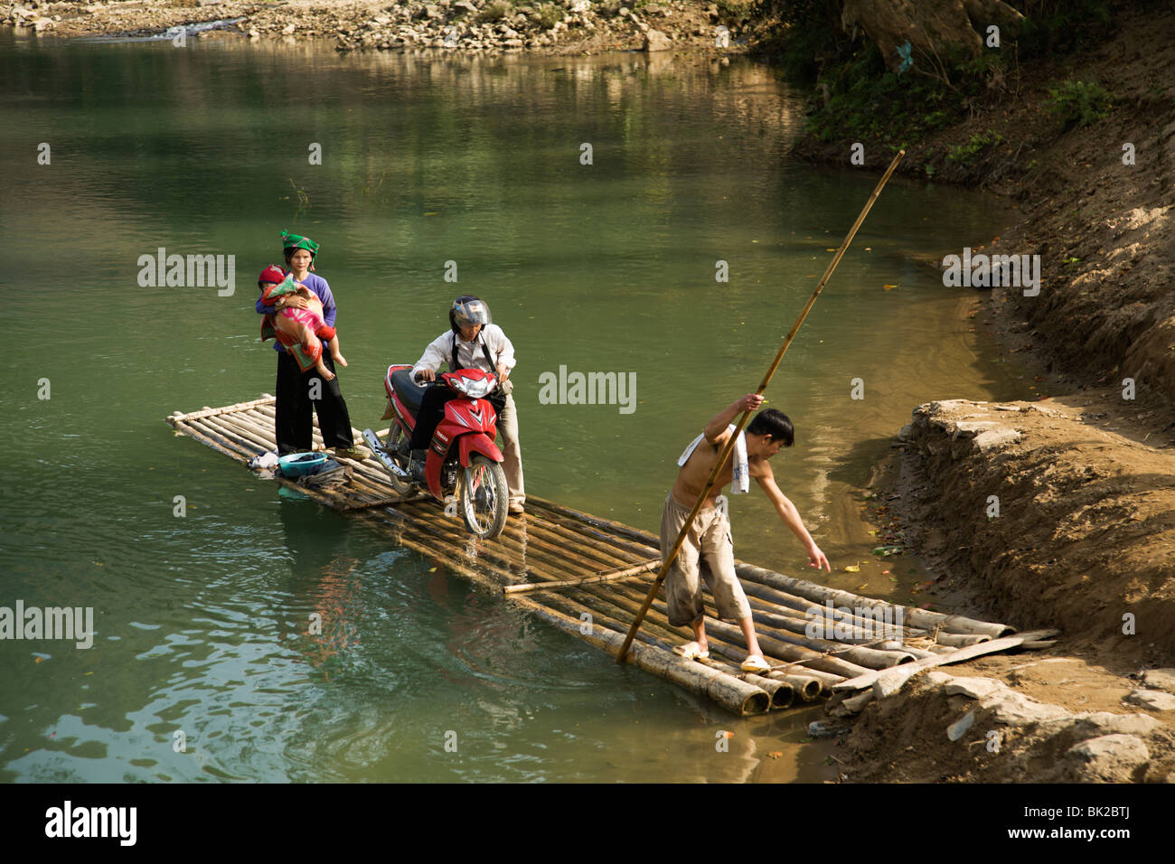 Local bamboo ferry on a tribituary to the Gam River in Ha Giang ...