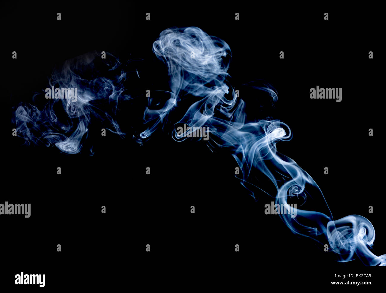 Incense smoke, abstract shape on black background Stock Photo - Alamy