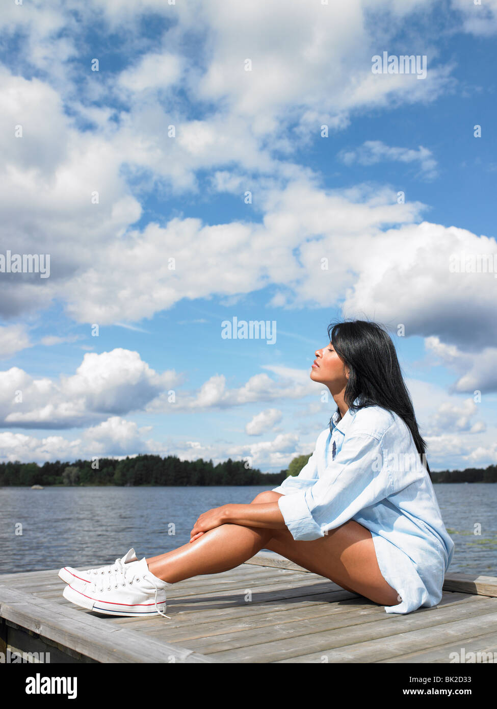 Woman reconnecting with nature Stock Photo - Alamy