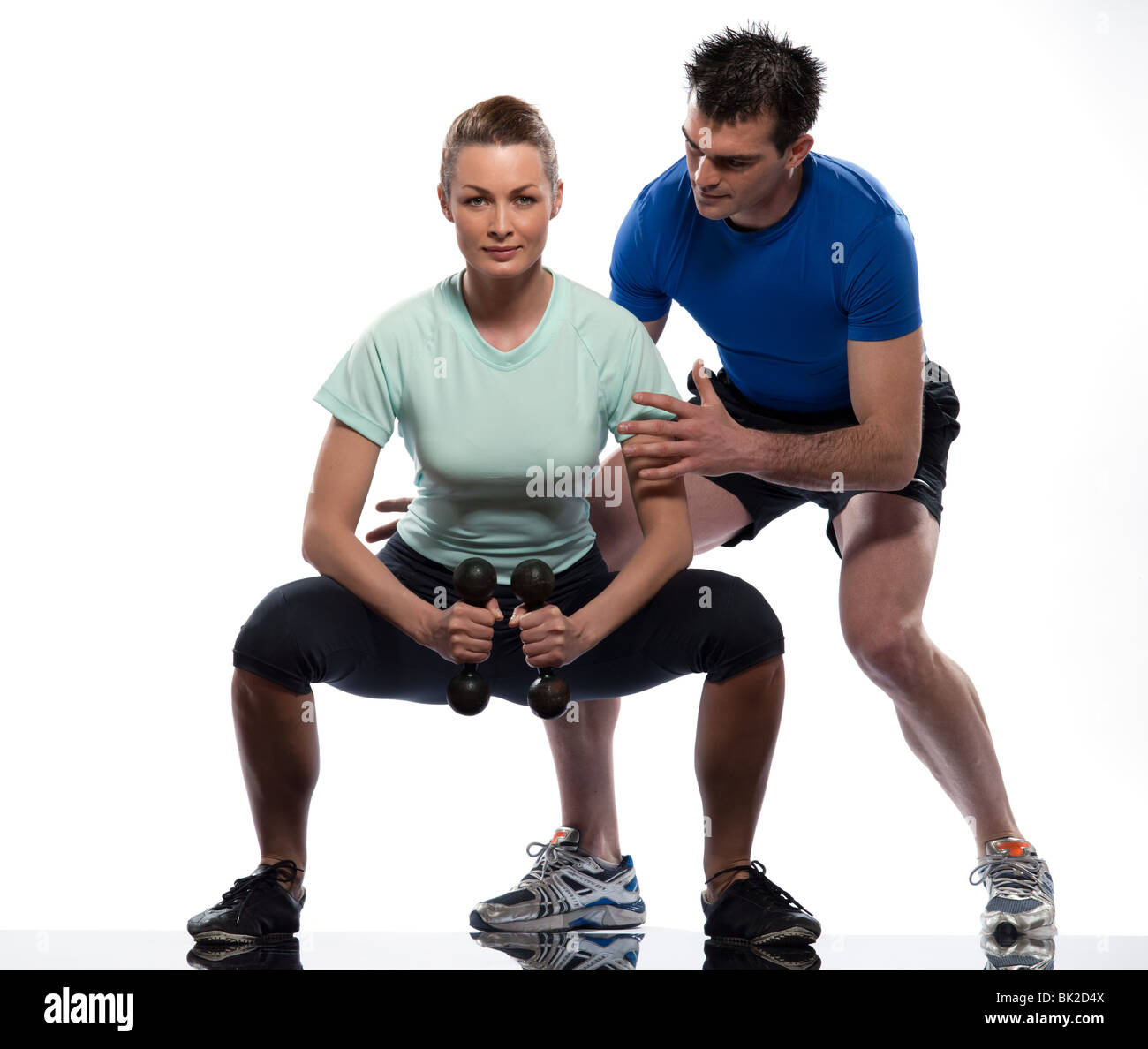 couple man and woman exercising workout on white background Stock Photo ...