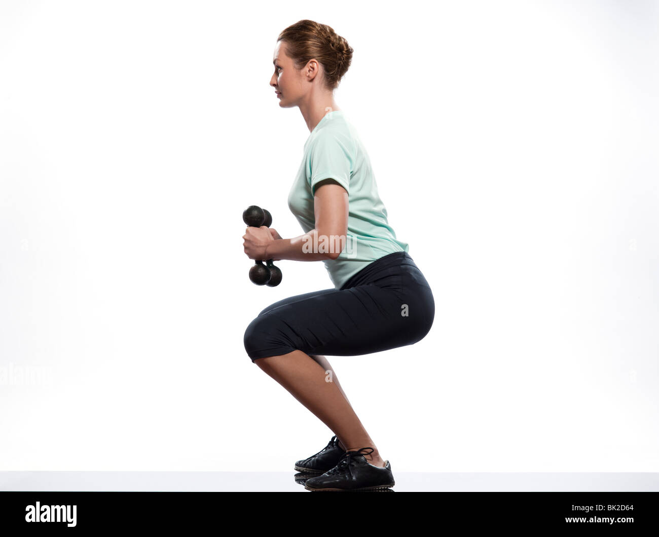 one beautiful caucasian woman exercising Weight Training workout on ...