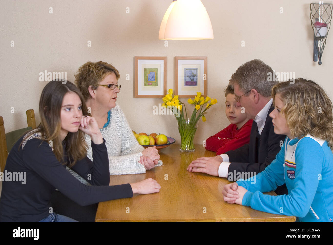 Three children inside table hi-res stock photography and images - Alamy