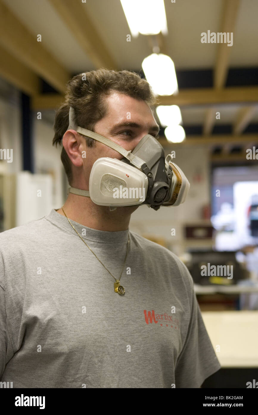 Worker wearing protection mask Stock Photo - Alamy