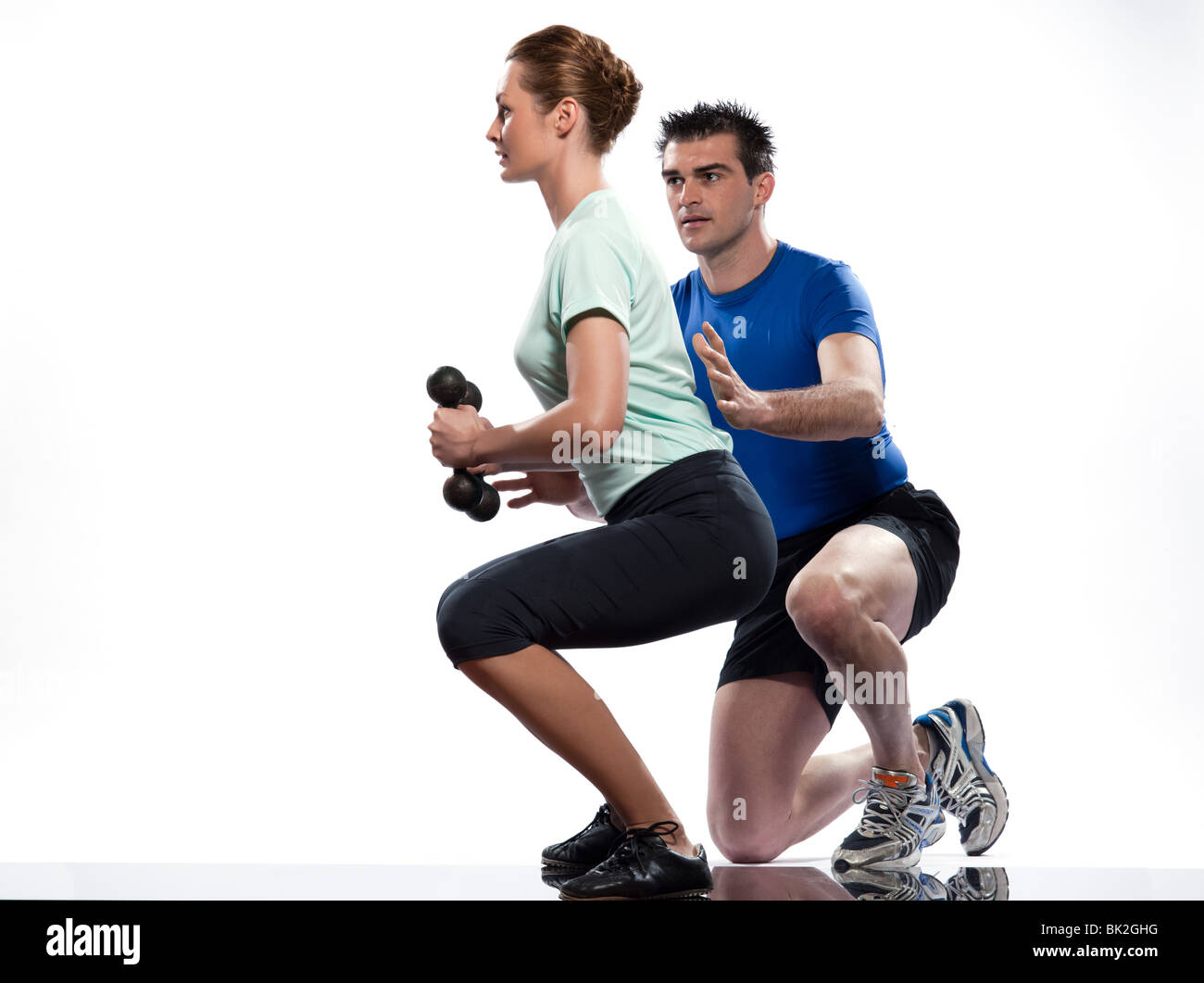 couple man and woman exercising workout on white background Stock Photo ...