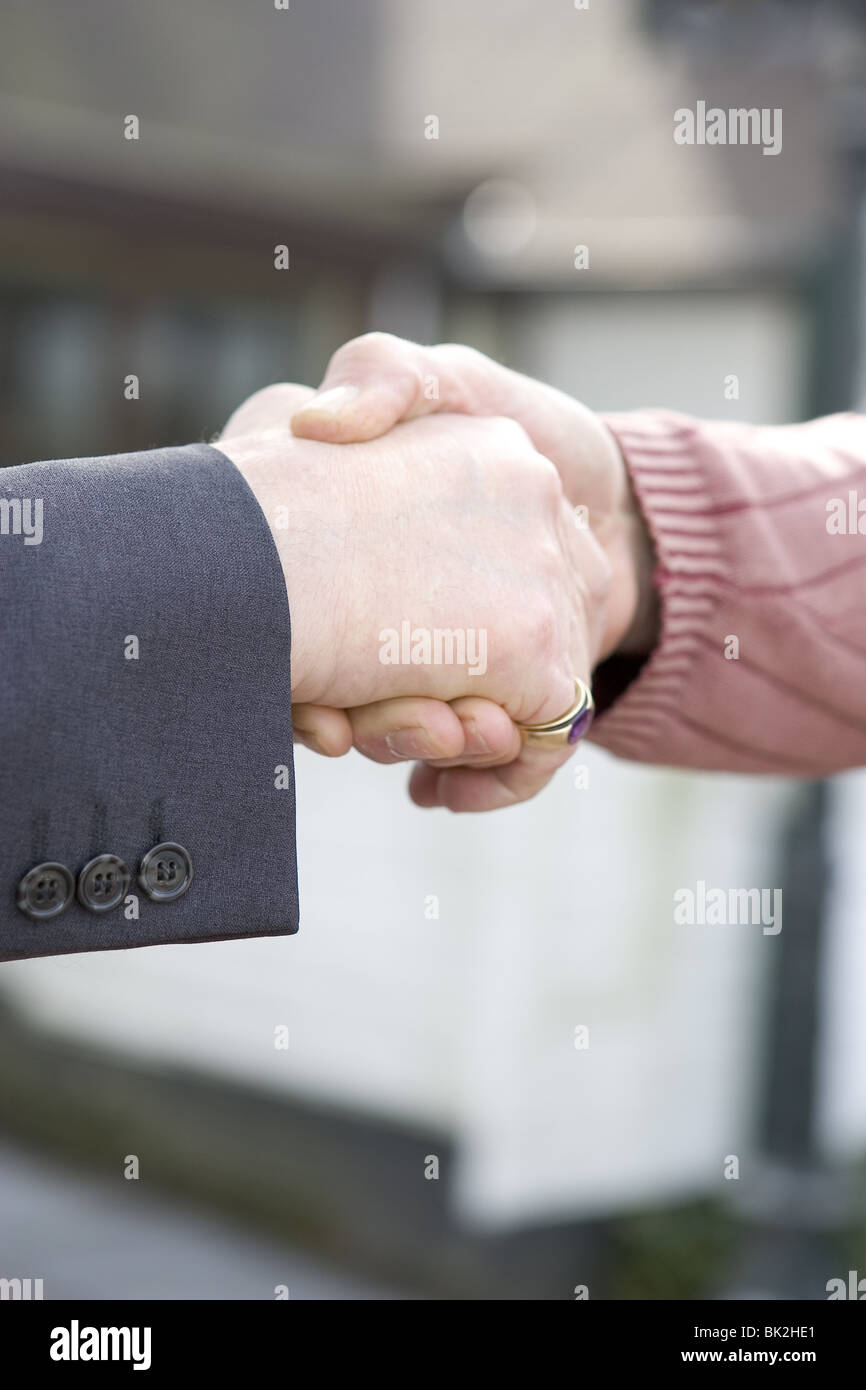 Secret handshake hi-res stock photography and images - Alamy
