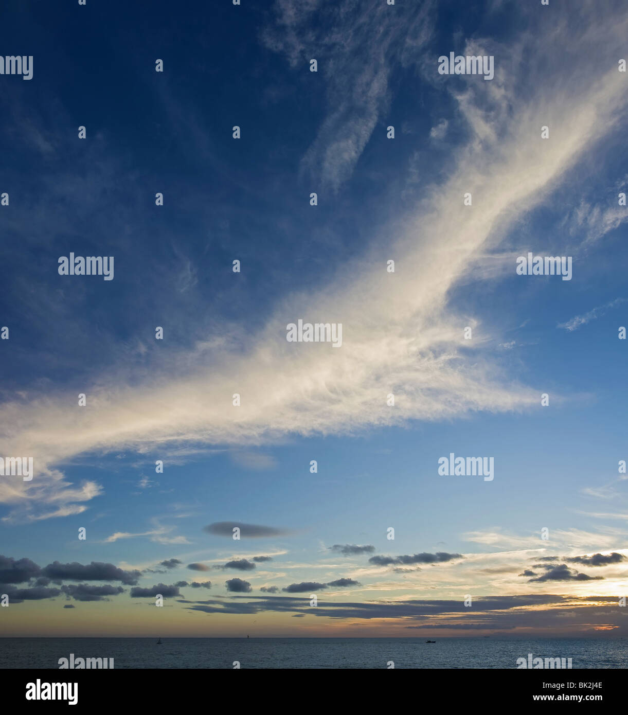 Clouds lit during a beautiful sunset in Genova, Italy Stock Photo - Alamy