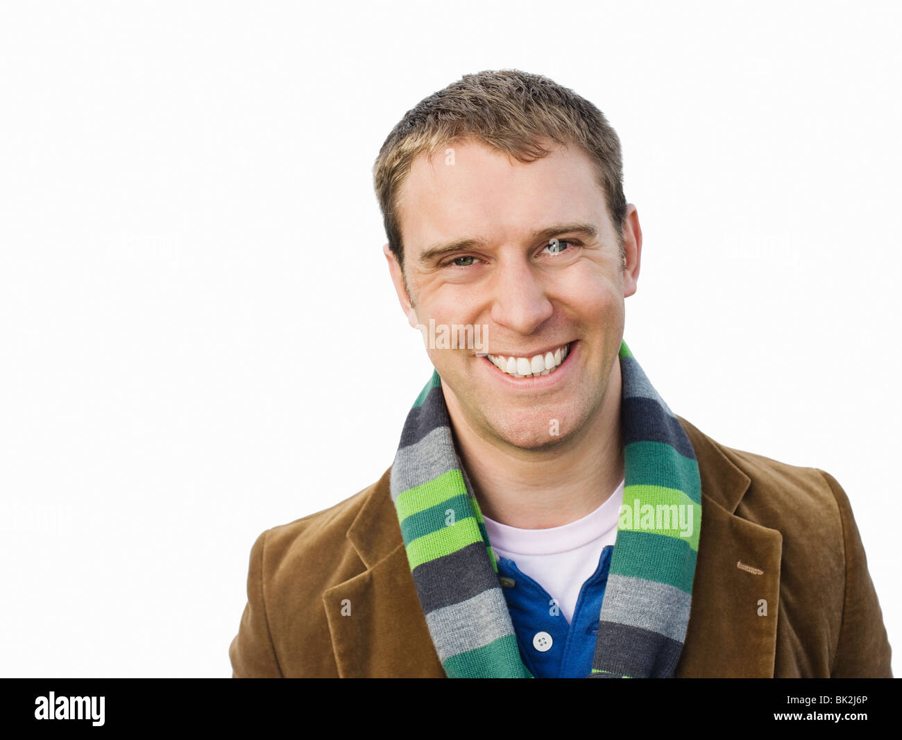 Portrait of man smiling at camera Stock Photo - Alamy