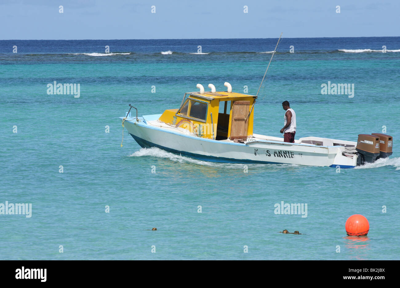 Fisher boat in Tobago Stock Photo - Alamy