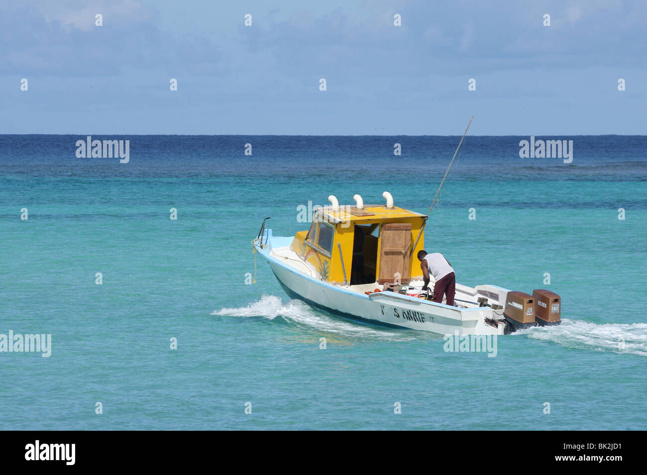 Fisher boat in Tobago Stock Photo - Alamy