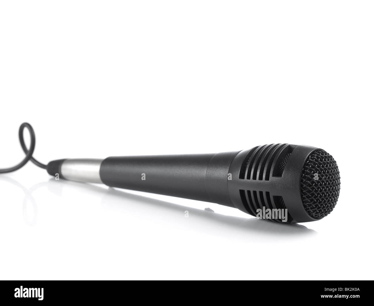 A black microphone isolated on white background Stock Photo - Alamy