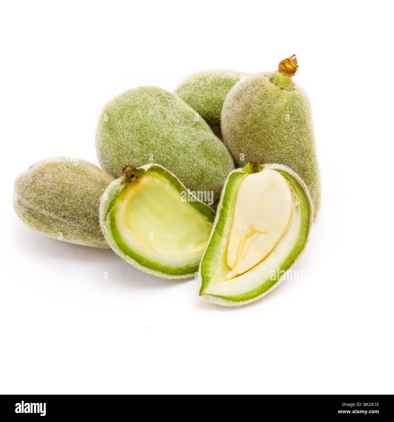 Green Almonds also known as Bitter Almonds isolated against white ...